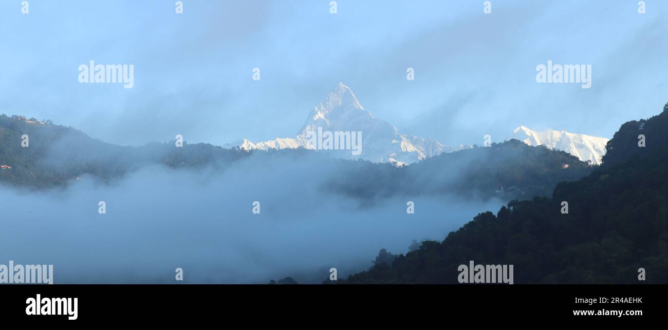 An aerial view of Mount Everest, the world's highest peak, shrouded in ...