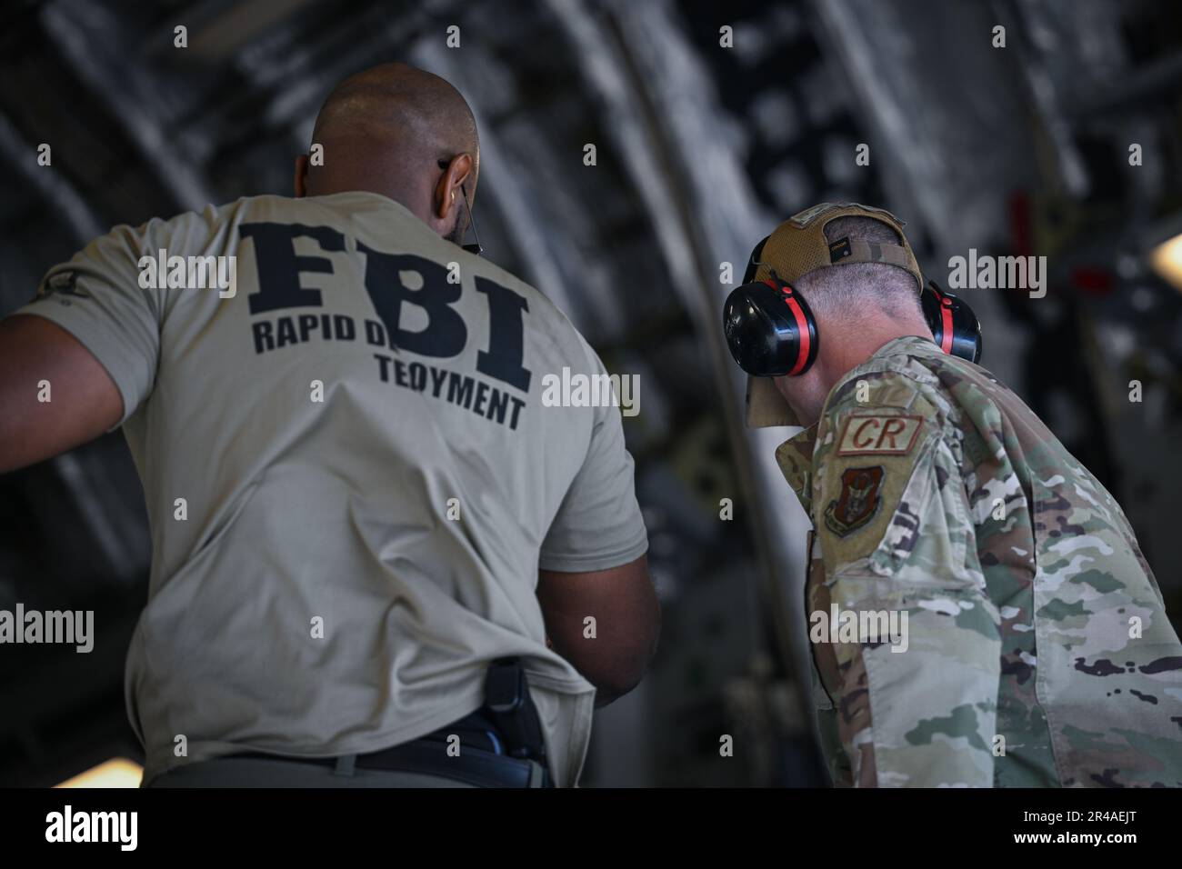 An Airman assigned to the 315th Contingency Response Flight, Joint Base ...