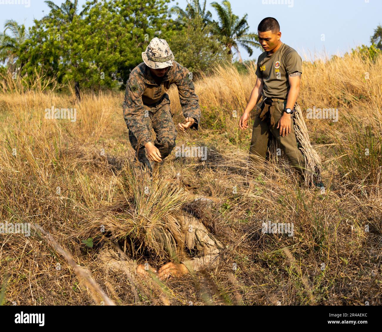 U.S. Marine Corps Cpl. Jonathon Damitio, bottom, a professionally ...
