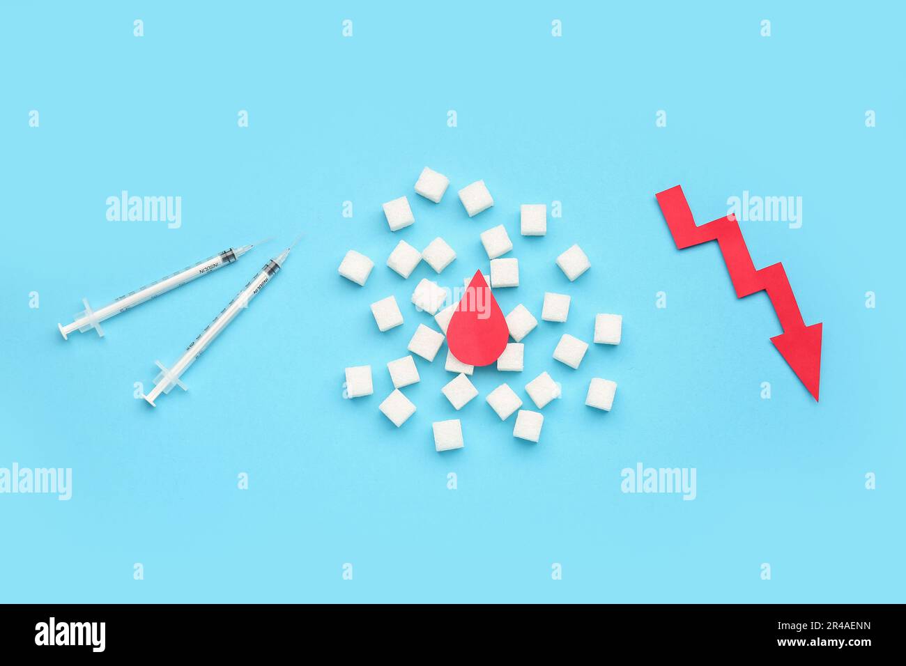 Sugar with blood drop, syringes for insulin injection and arrow ...
