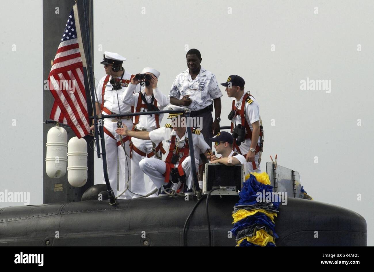 US Navy Cdr. Christopher Kaiser and the crew of the Los Angeles-class ...