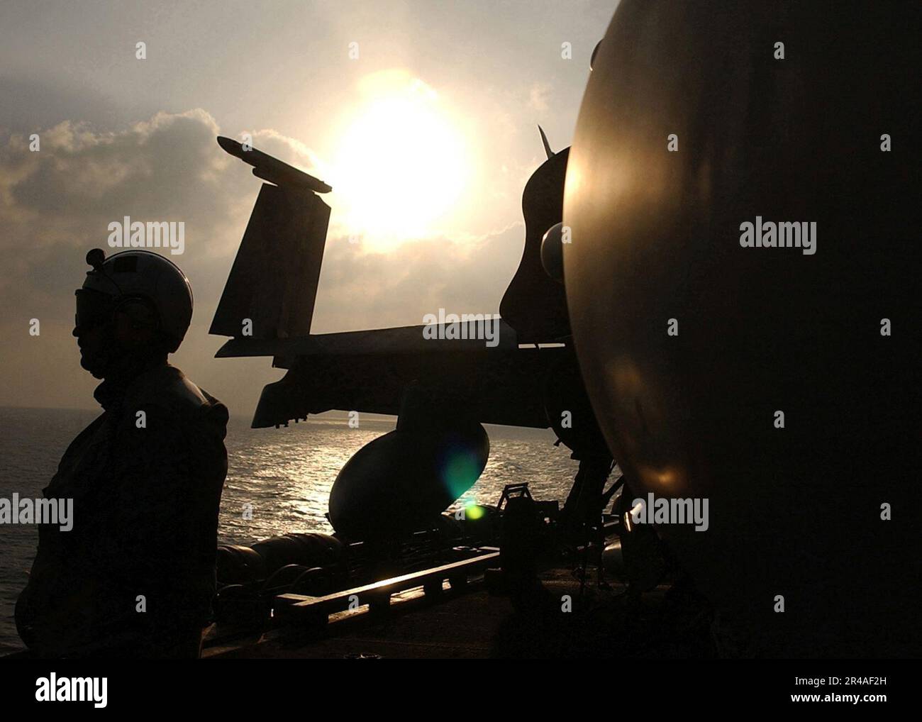 US Navy Safety Officer Cmdr. David Onstott looks out for the safety of ...