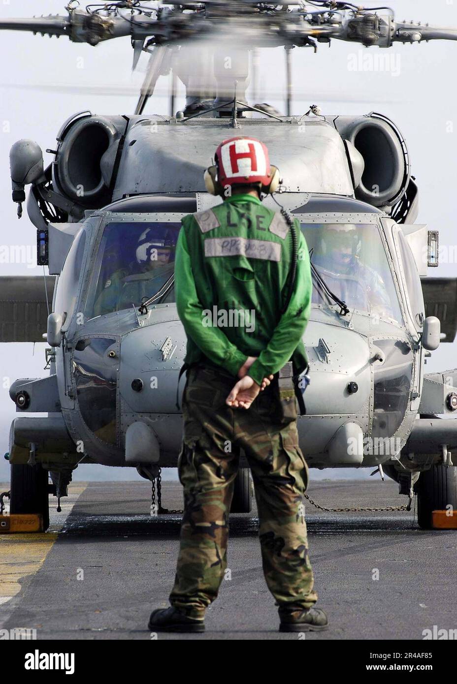 US Navy The Enlisted Landing Signalman assigned to the Golden Falcons of Helicopter Anti ...