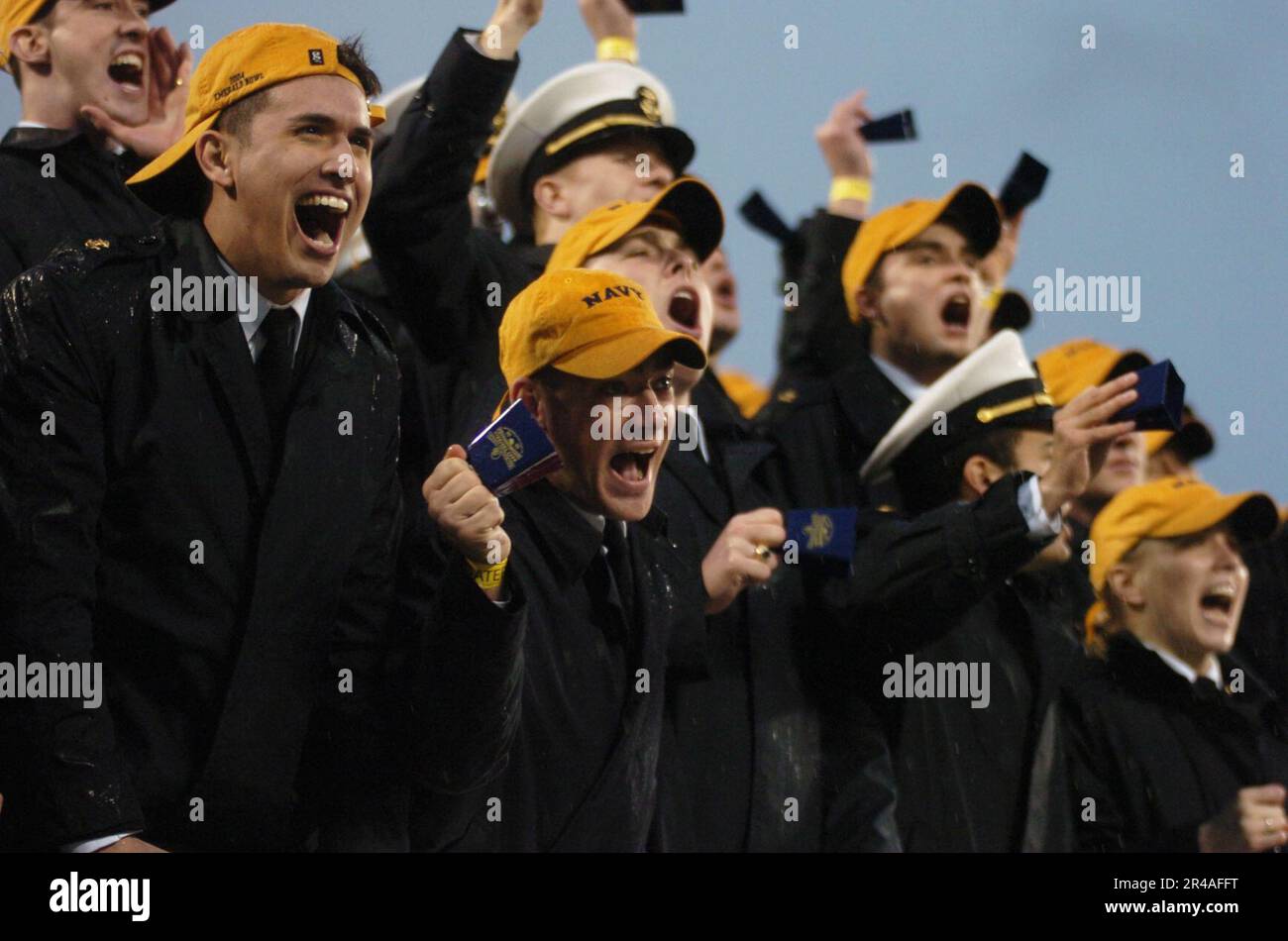 US Navy U.S. Naval Academy Midshipman in the stands cheer as the clock ...