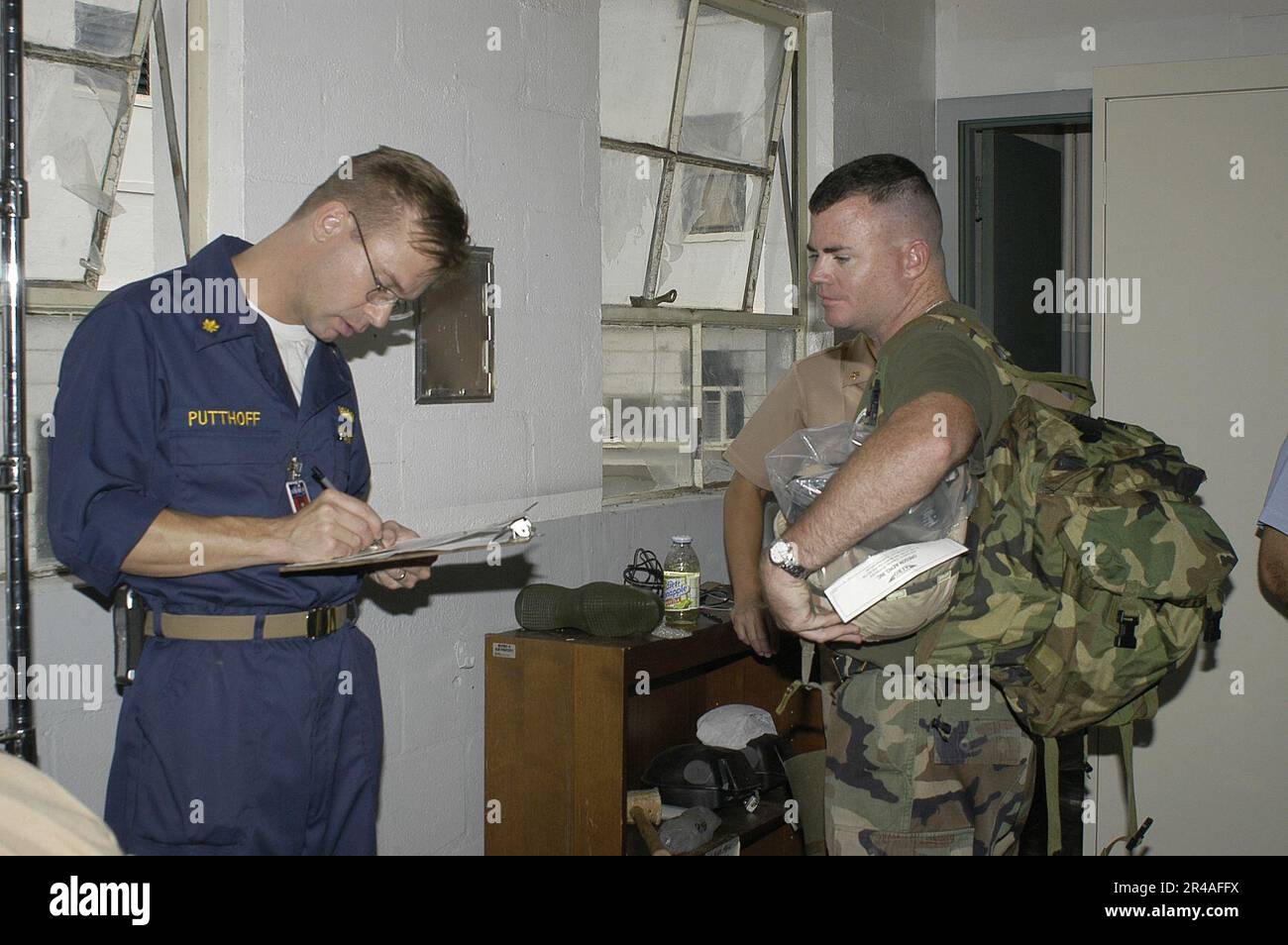 US Navy Lieutenant Commander Doug Putthoff, left, and Lieutenant Pete ...
