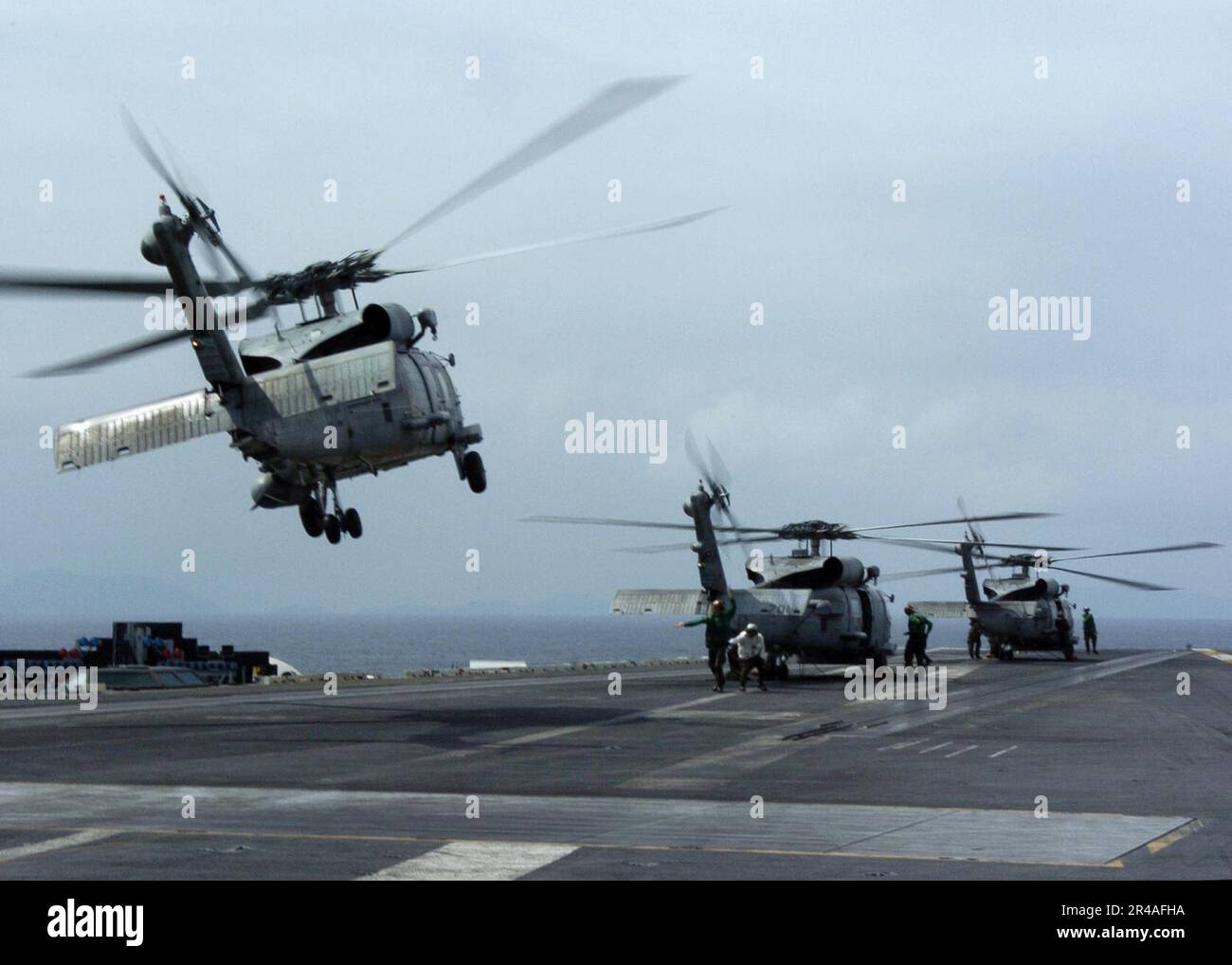 US Navy Helicopters depart USS Abraham Lincoln (CVN 72) en route to ...