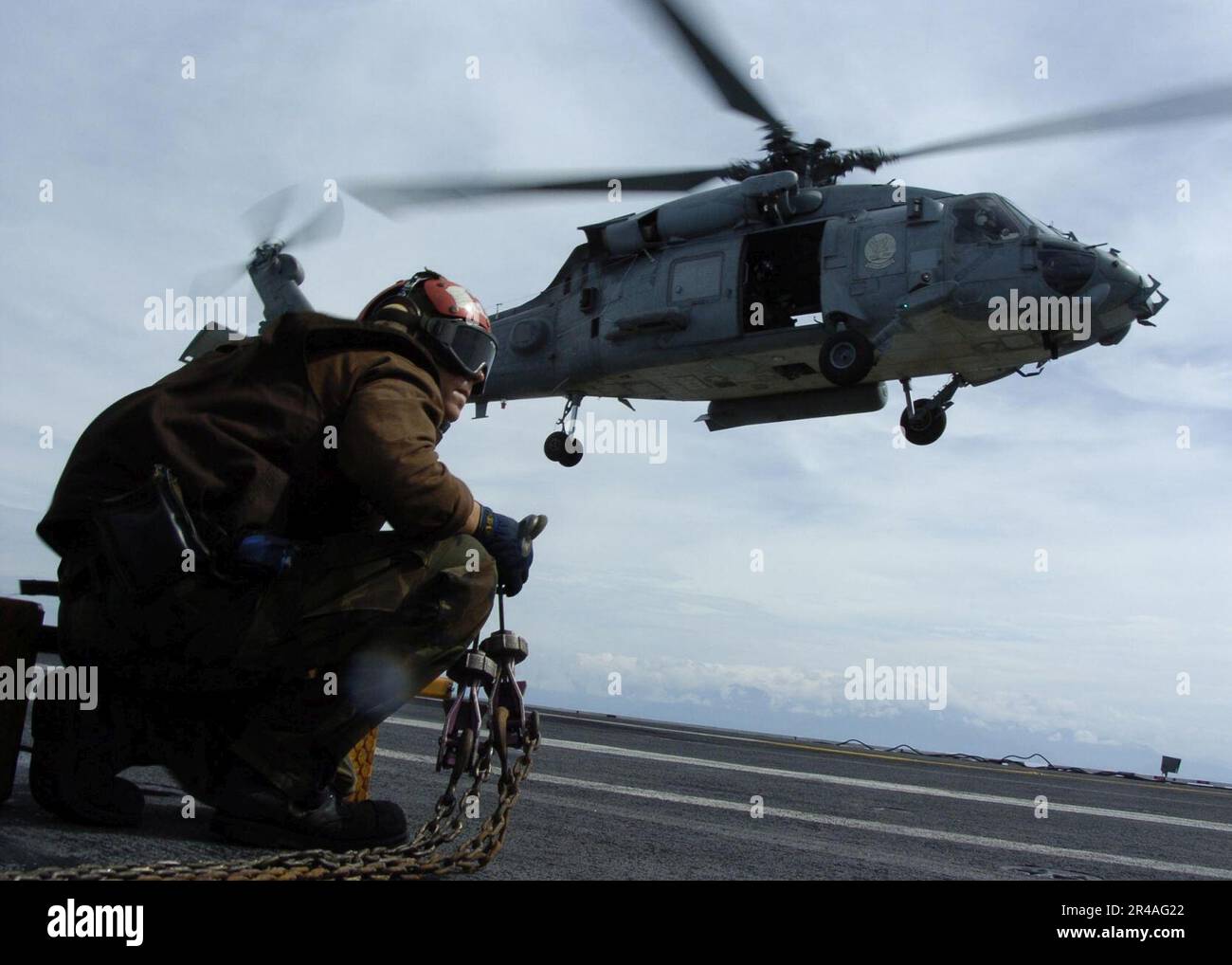 US Navy Personnel assigned to the Golden Falcons of Helicopter Anti ...