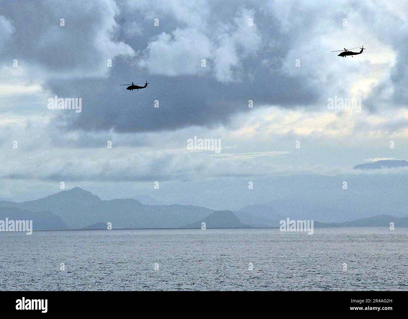 US Navy Seahawk helicopters depart USS Abraham Lincoln (CVN 72) en ...