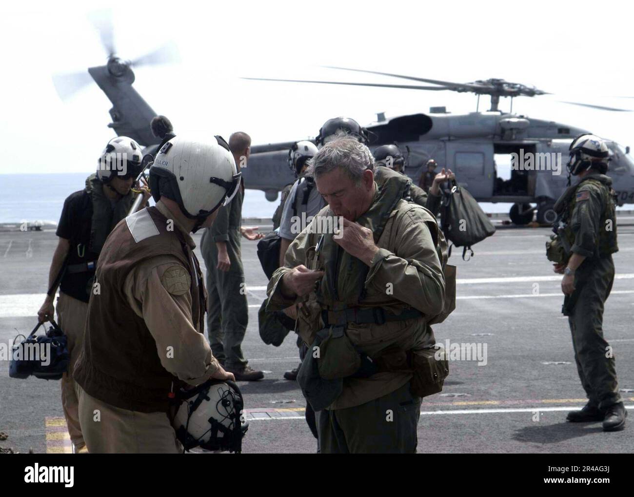 US Navy CBS Anchorman Dan Rather and his news crew return to the USS ...