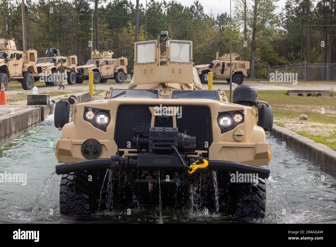 U.S. Marines 6th Marine Regiment, 2d Marine Division conduct a fording ...