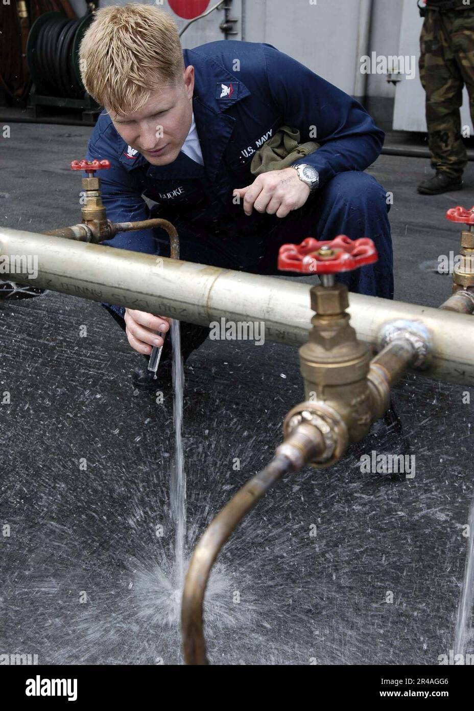 US Navy A Sailor assigned to the Safety Department aboard USS Abraham ...