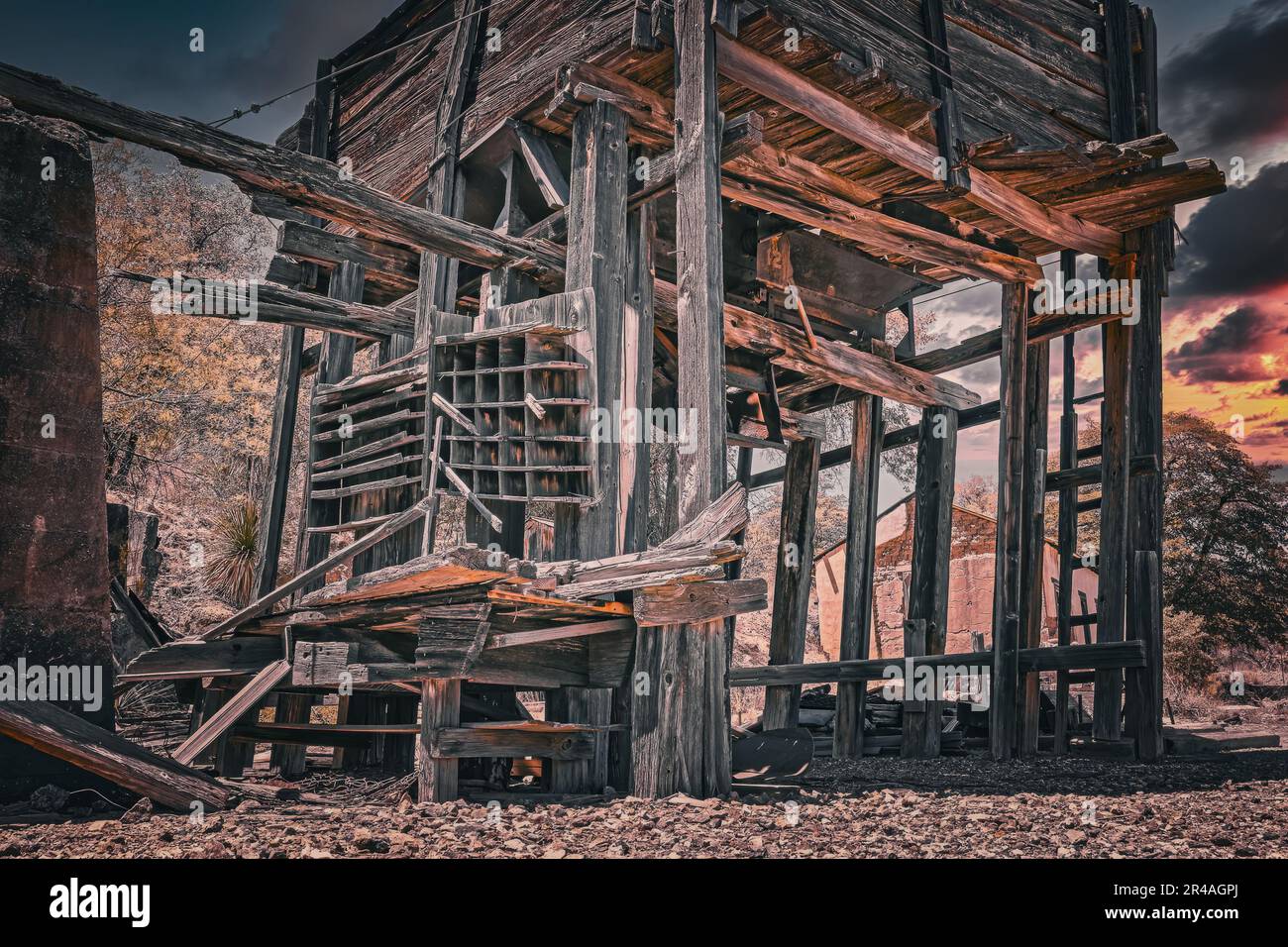 A derelict wooden building with a collapsed interior Stock Photo - Alamy