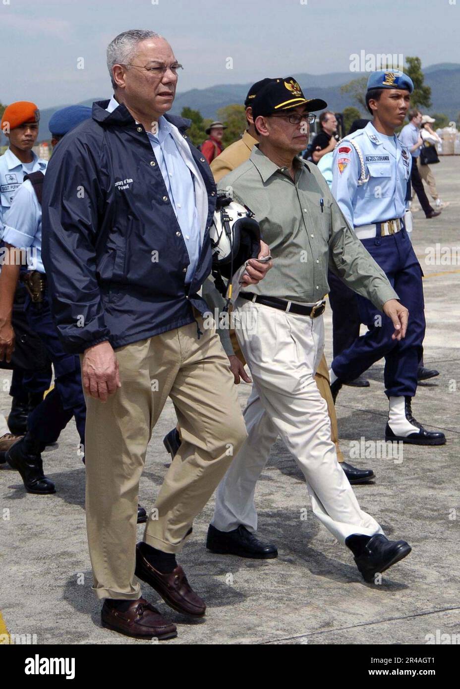 US Navy Secretary of State Colin Powell walks with the Indonesian ...