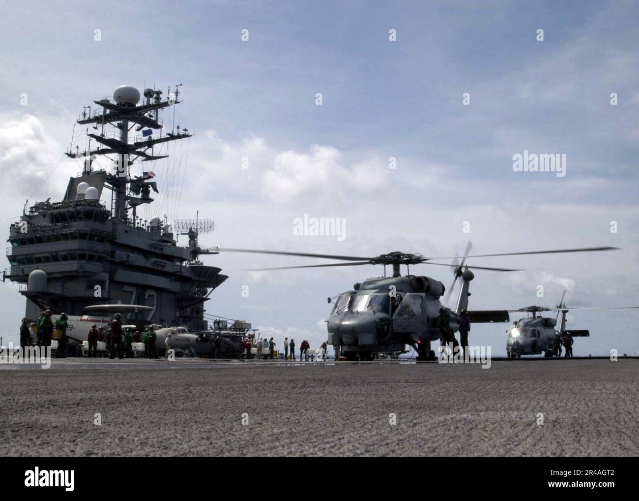 US Navy Two SH-60B Seahawks, assigned to the Saberhawks of Helicopter ...