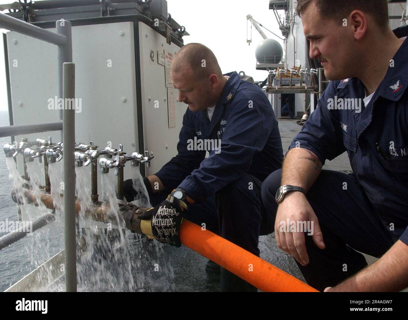 US Navy Hull Maintenance Technician 1st Class left, and Hull ...