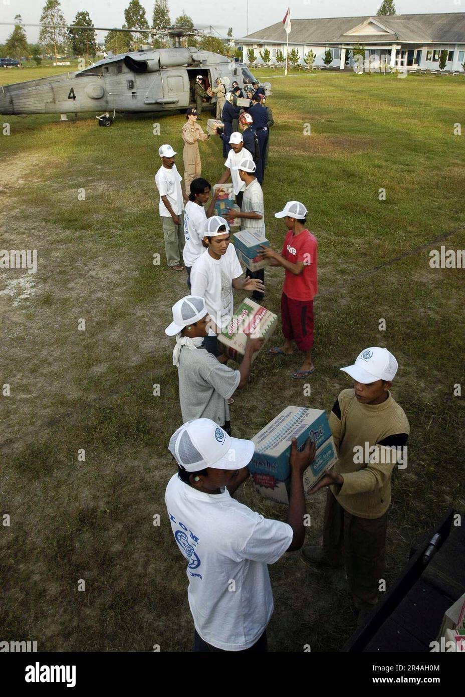 US Navy U.S. Navy personnel and aid workers from International ...
