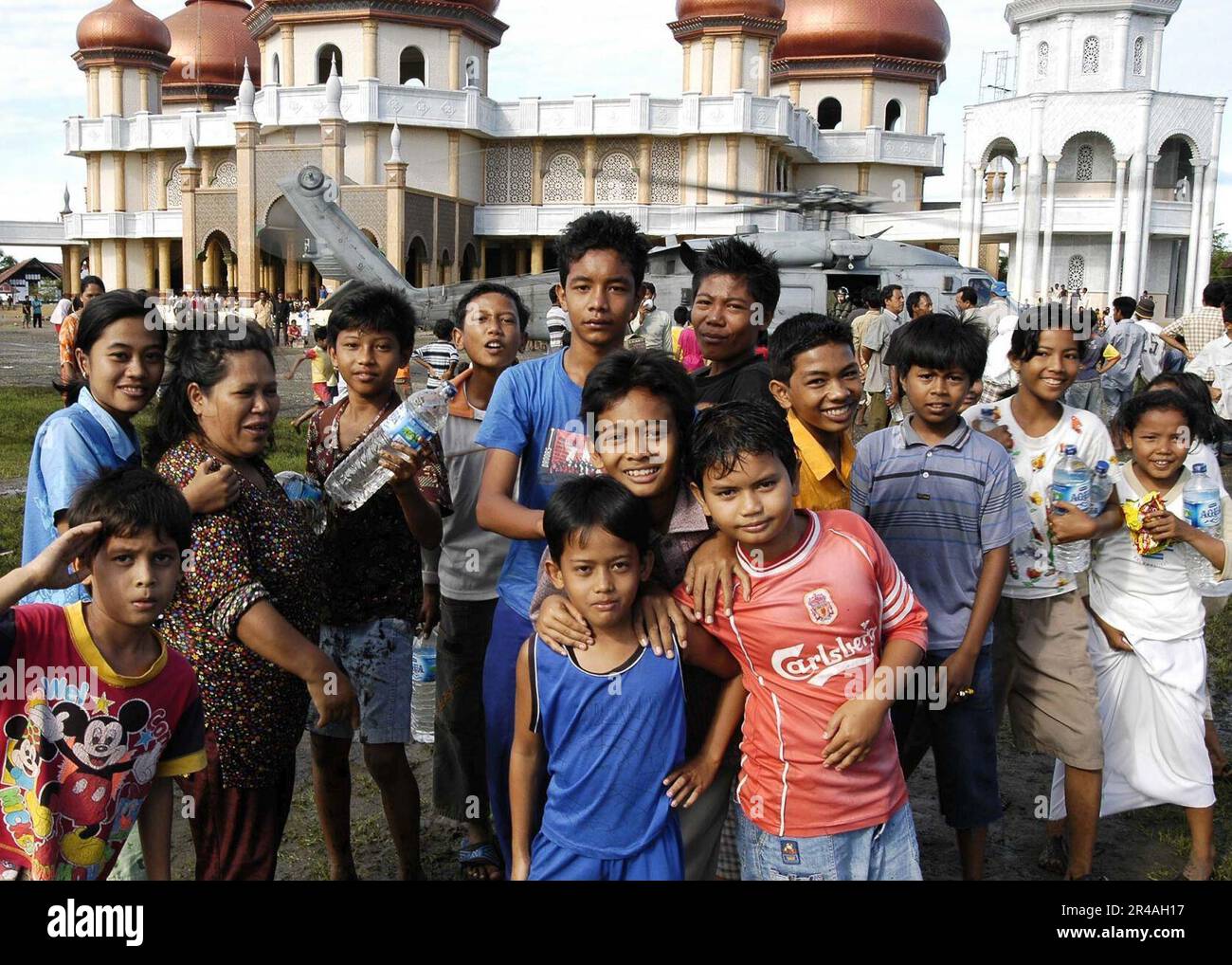 US Navy Children of Meulaboh, Sumatra, Indonesia drink the long awaited ...