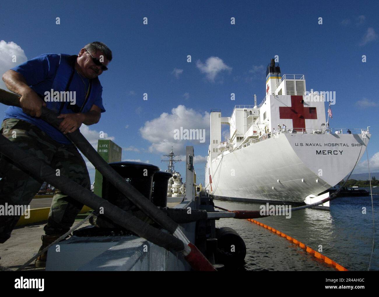 US Navy Nick Revuelto, a line handler for Naval Station Pearl Harbor ...