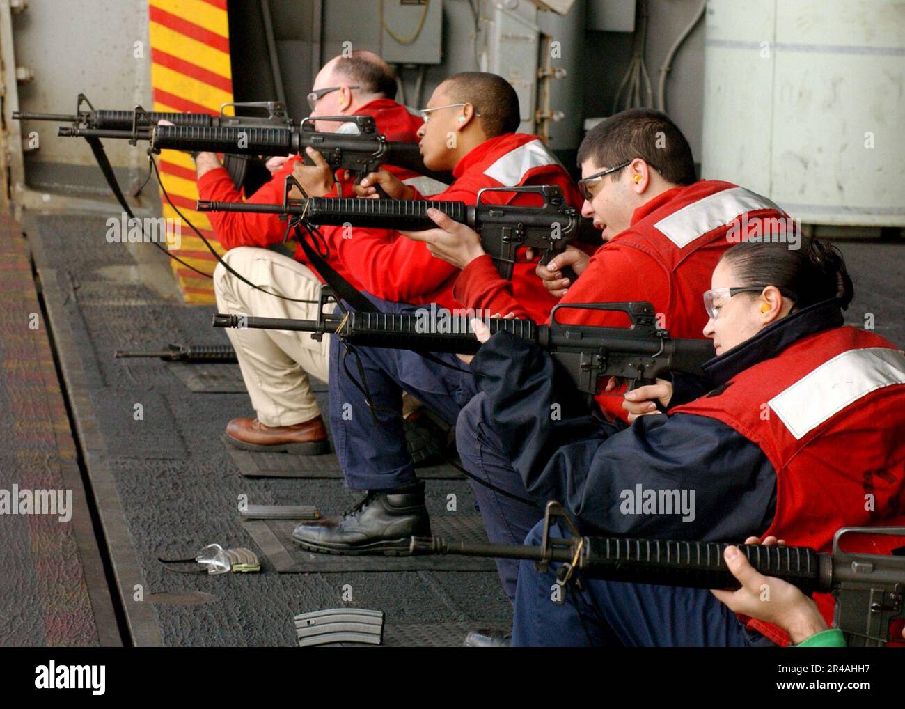 US Navy USS Harry S. Truman (CVN 75) crew members participate in a ...