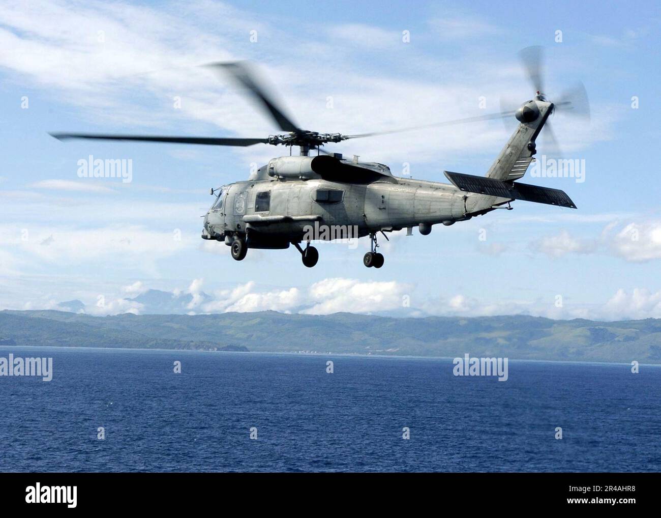 US Navy An SH-60B Seahawk takes off from the flight deck aboard USS ...