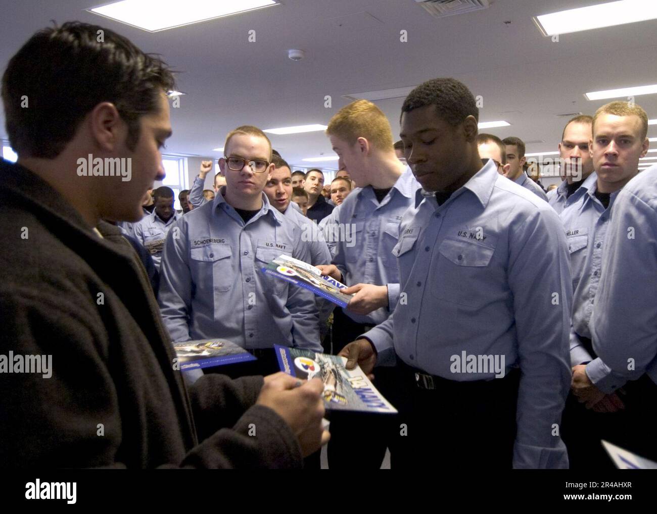 US Navy David Stremme, driver for the Navy NASCAR racing team, hands ...