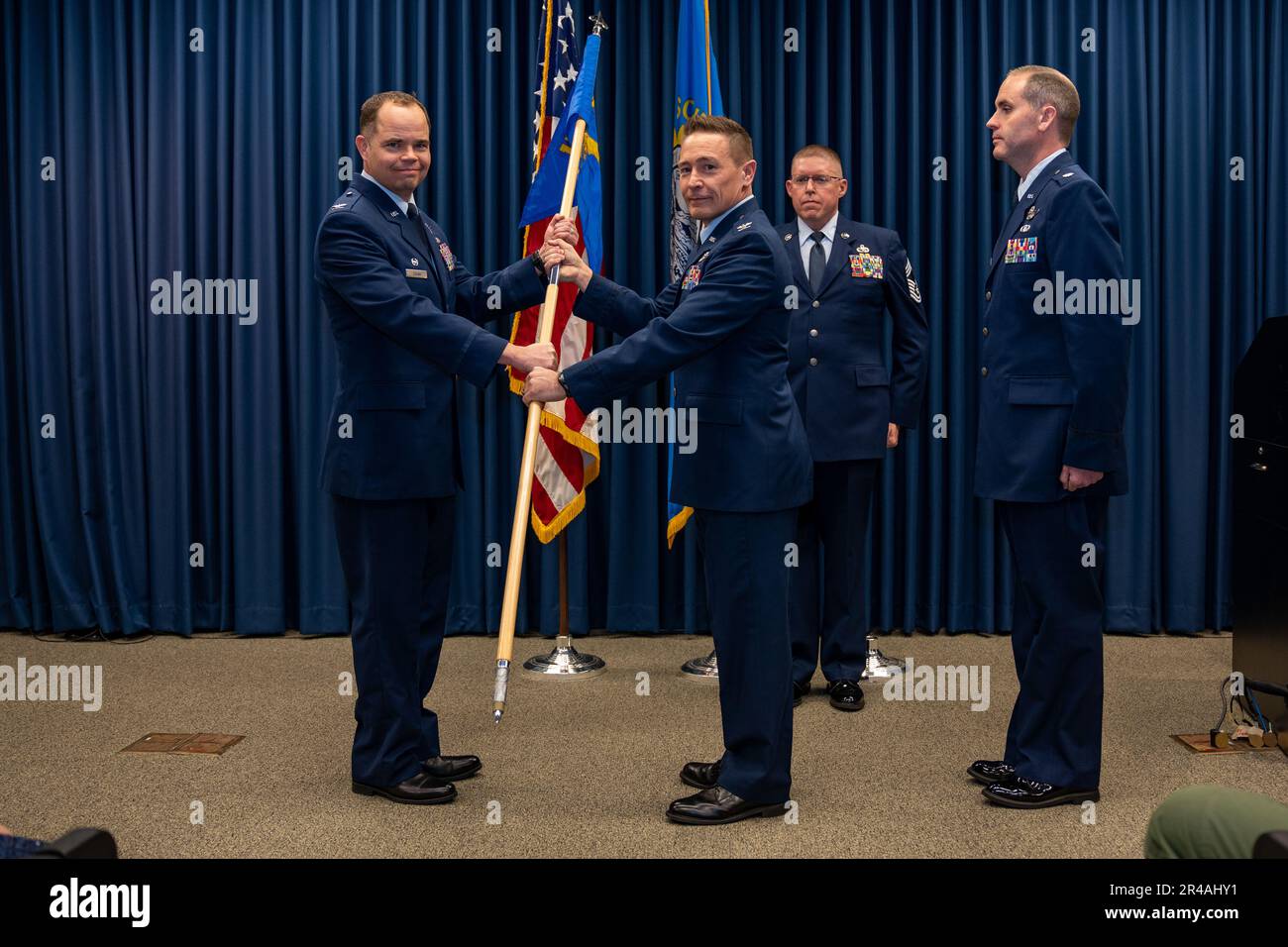 U.S. Air National Guard Col. Josh Wika, center, outgoing commander ...