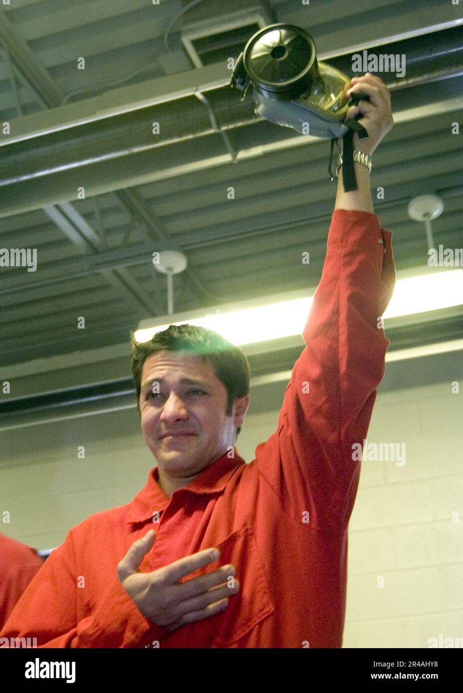 US Navy David Stremme, driver for the Navy NASCAR racing team, holds ...