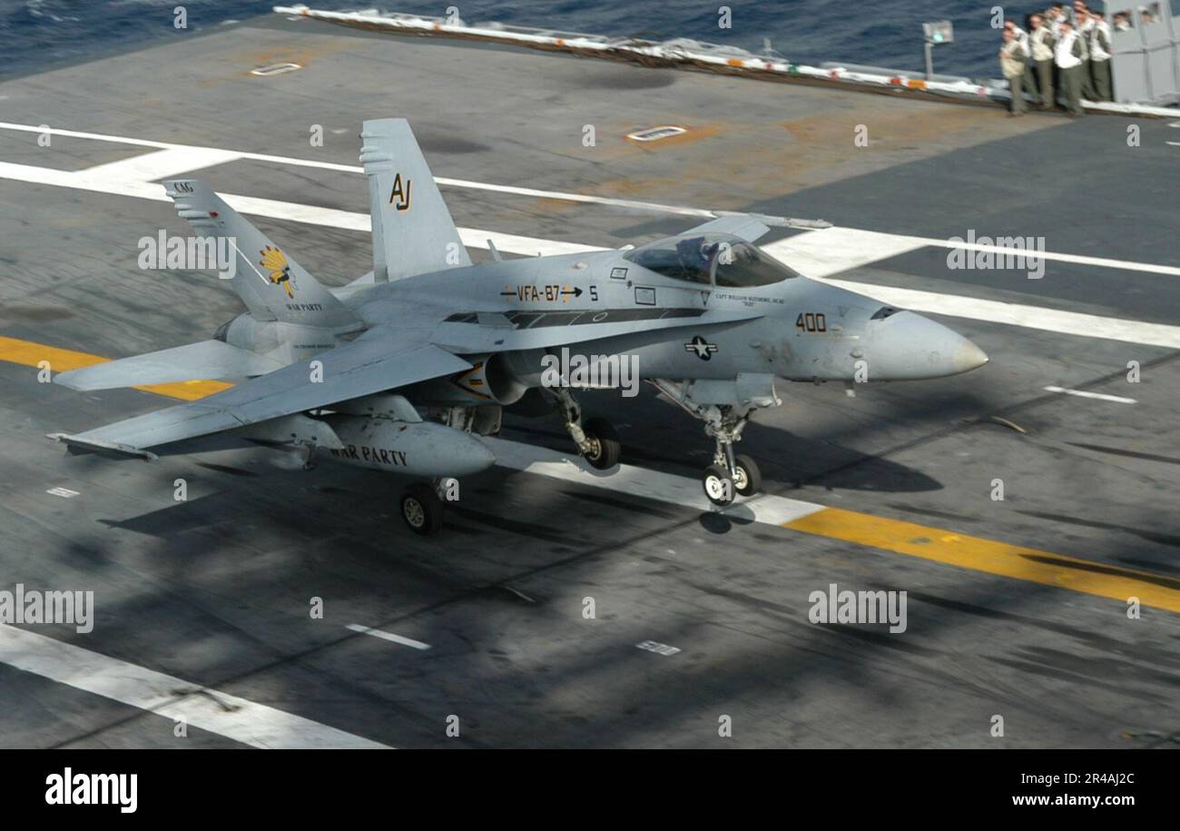 US Navy An F-A-18C Hornet is recovered during flight deck operations ...
