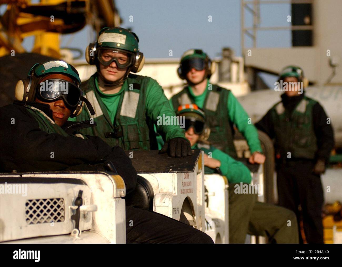 US Navy Sailors assigned to the Launch and Recovery Division in the Air ...