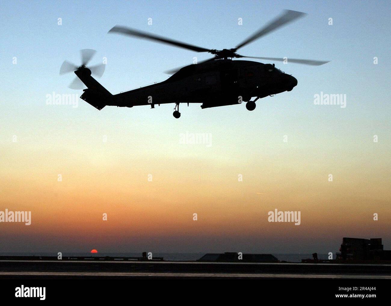 US Navy An SH-60F Seahawk comes in for a landing aboard USS Harry S ...