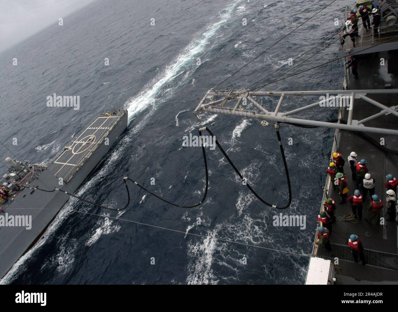 US Navy USS Kearsarge (LHD 3) crew members man a refueling station as ...