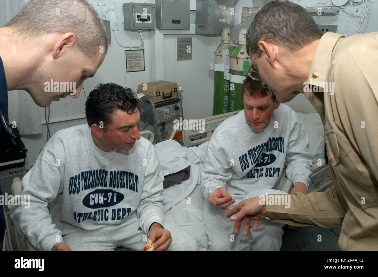 US Navy John Raye and Corey Glynn of Ottawa, Canada, receive medical ...