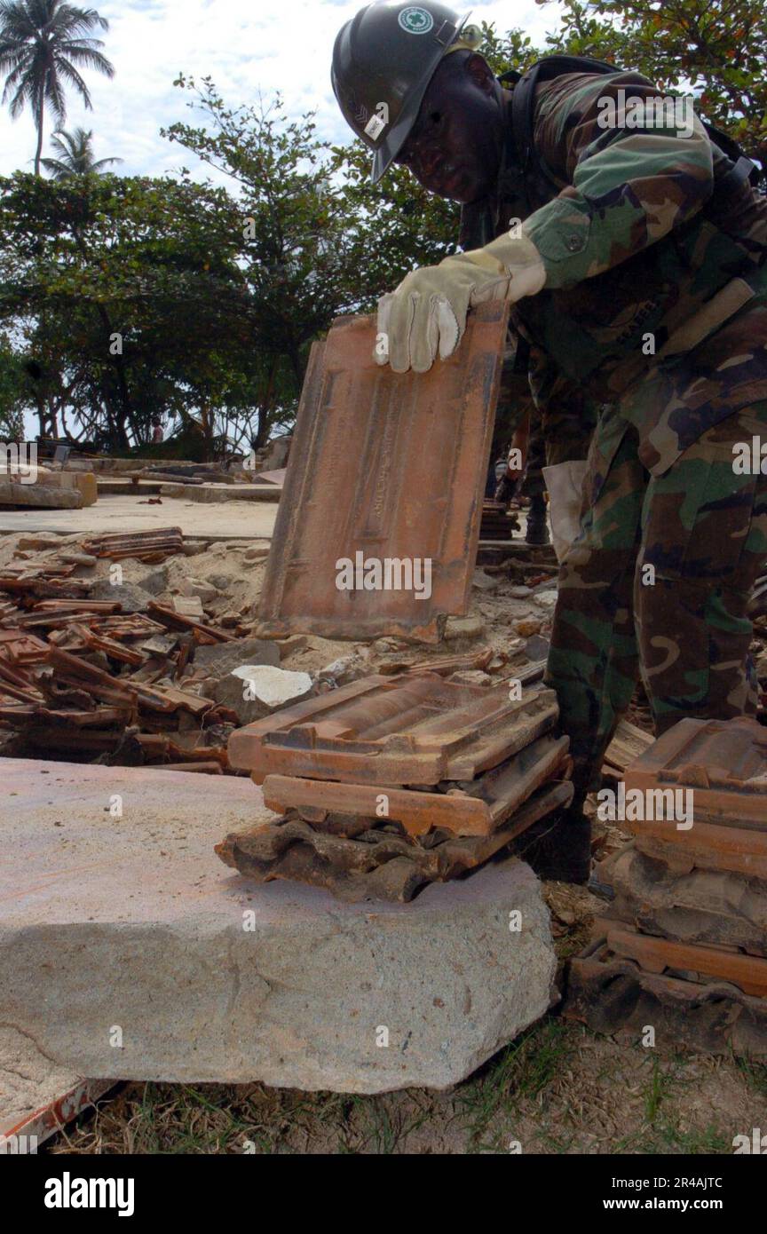 US Navy Steelwoker 1st Class assigned to Naval Mobile Construction ...