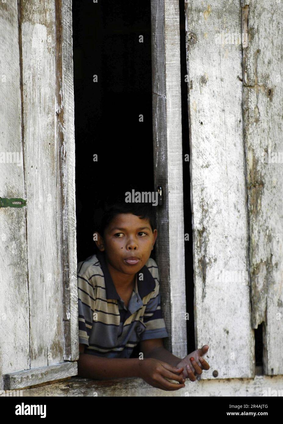 US Navy An Indonesian boy in Gunung Setui on the island of Sumatra ...