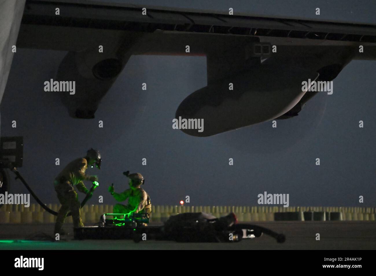 Two U.S. Air Force Forward Area Refueling Point specialists pack away ...