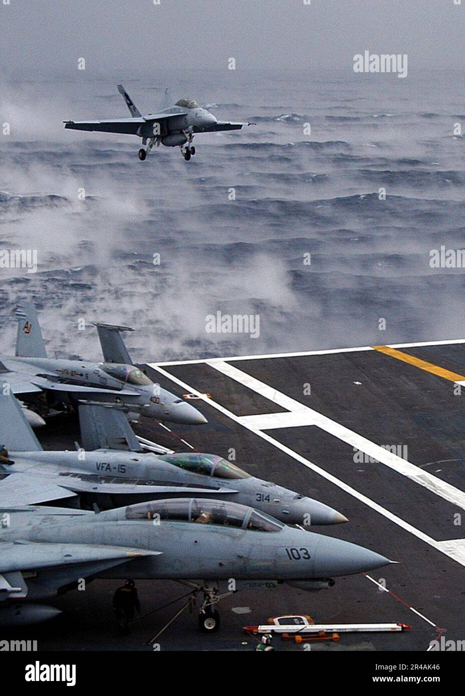 US Navy An F-A-18F Super Hornet lands on the flight deck of USS ...