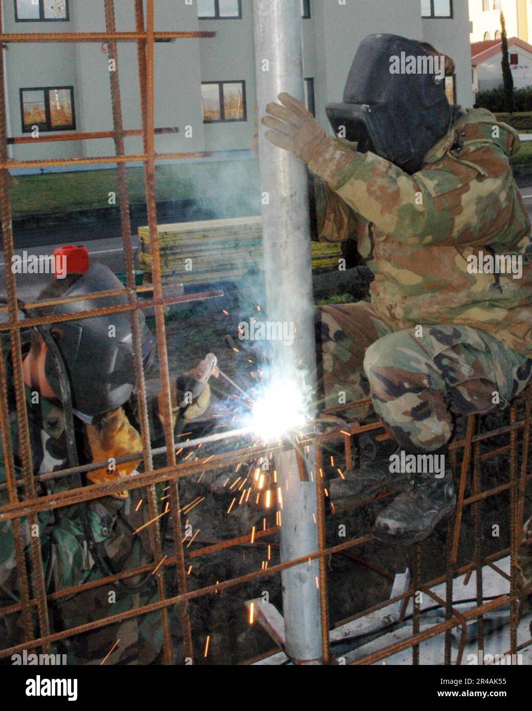 US Navy A Seabee, assigned to Naval Mobile Construction Battalion Four ...