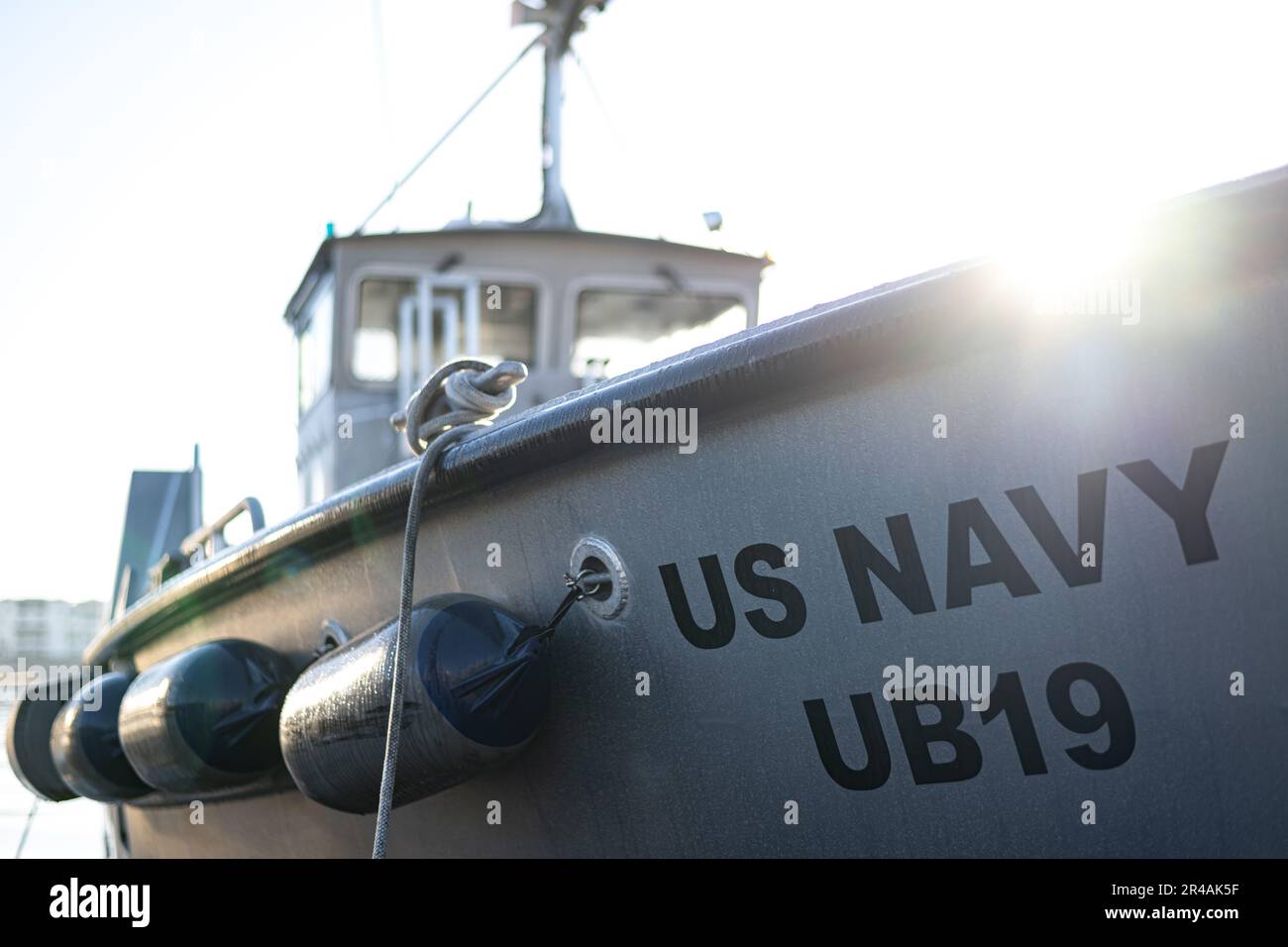 A U.S. Navy vessel sits in the water at Rattlesnake Point U.S. Army ...
