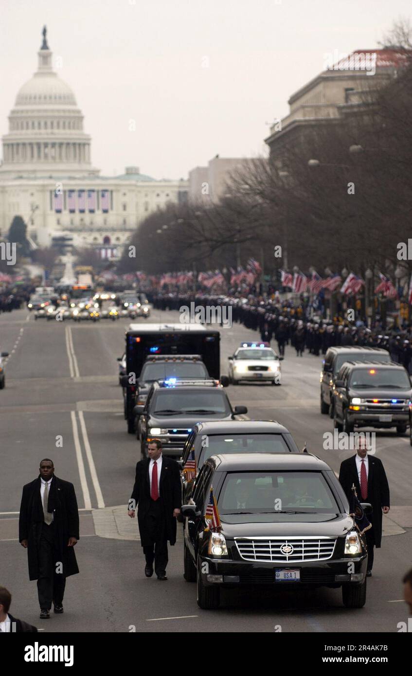 US Navy Flanked by Secret Service agents, President George W. Bush and ...