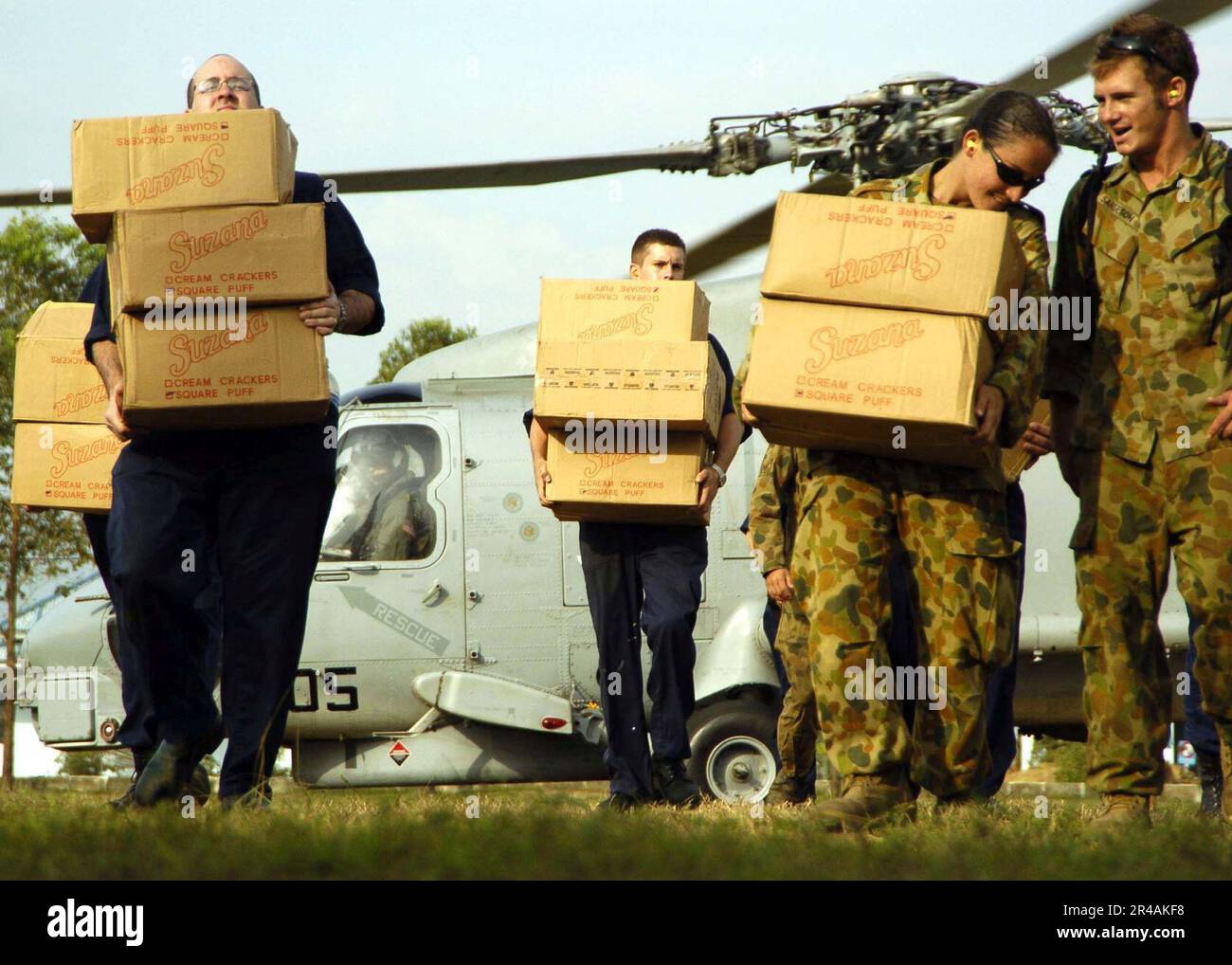 US Navy Sailors assigned to USS Abraham Lincoln (CVN 72) and members of ...