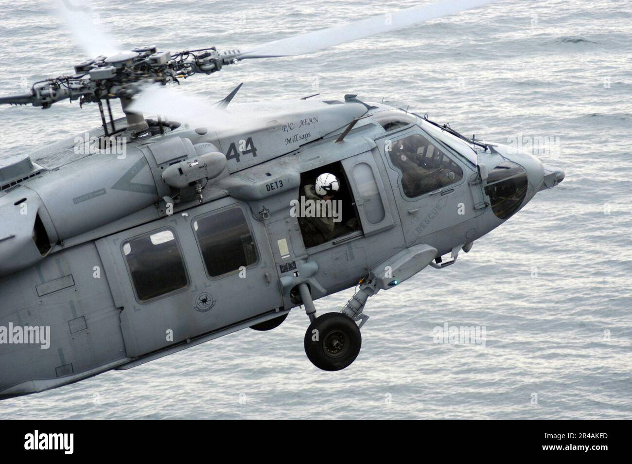 US Navy A MH-60S Seahawk, assigned to Helicopter Combat Support Squadron Eight (HC-8), takes off ...