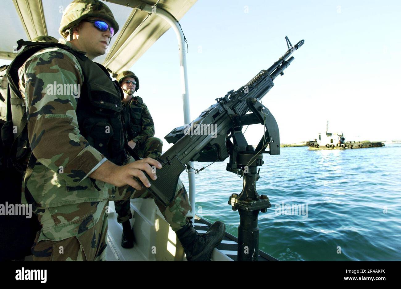 US Navy Gunner's Mate 2nd Class left, and Boatwain's Mate 1st Class ...