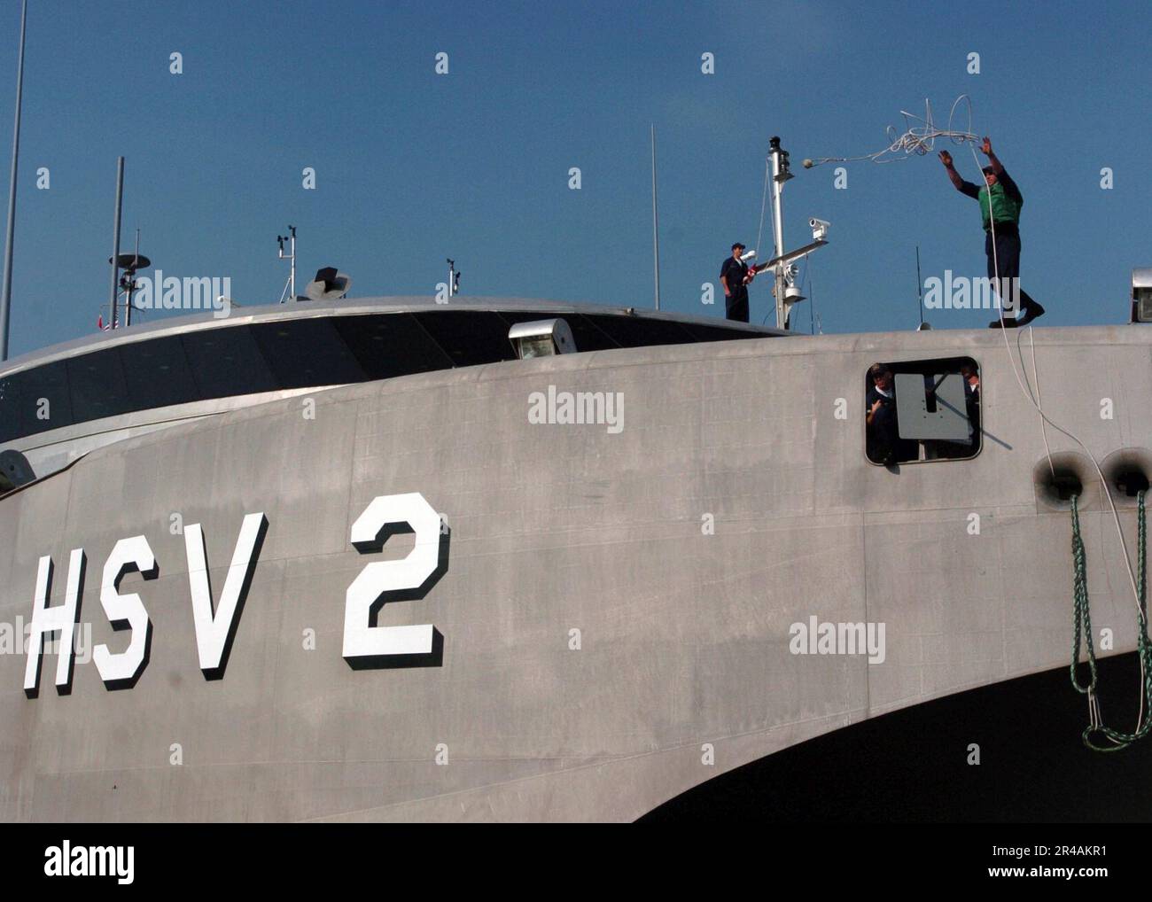 US Navy A crew member assigned to the High Speed Vessel Two (HSV 2 ...