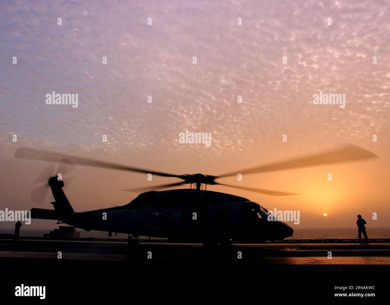 US Navy An SH-60F Seahawk helicopter, assigned to the Dusty Dogs of ...