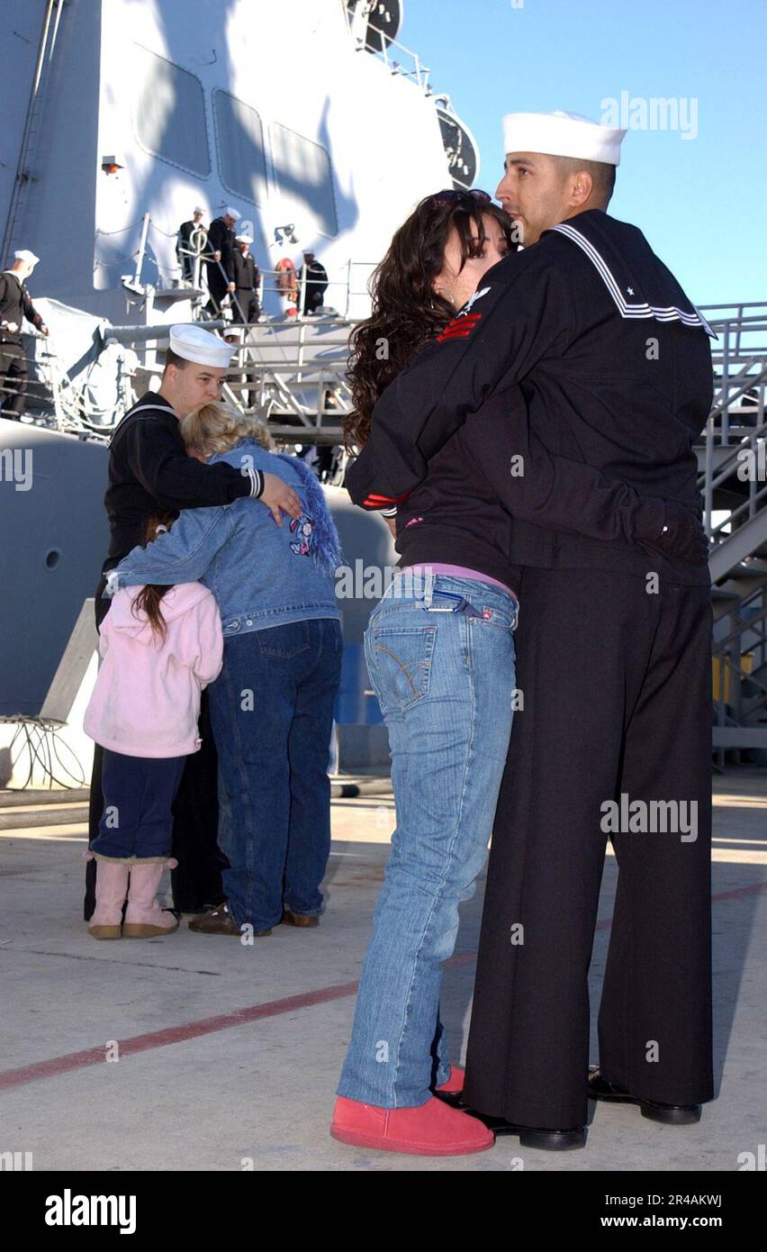 US Navy Sailors assigned to the guided missile destroyer USS Mustin ...