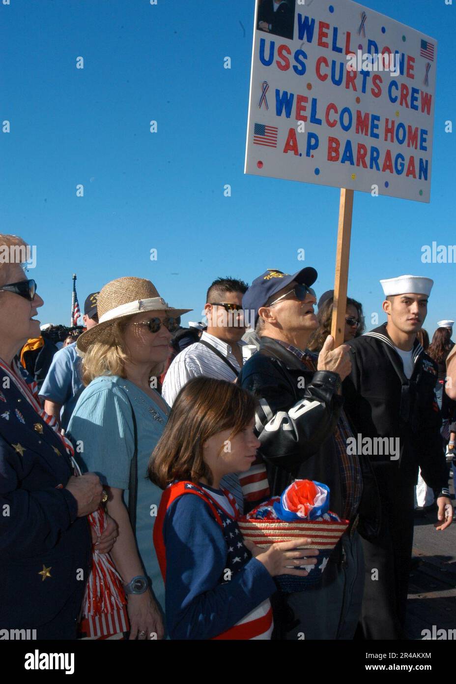 US Navy Family and friends wait for their loved ones returning from a ...