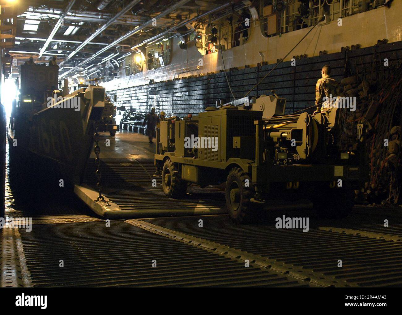 US Navy Seabees, assigned to Naval Mobile Construction Battalion One ...