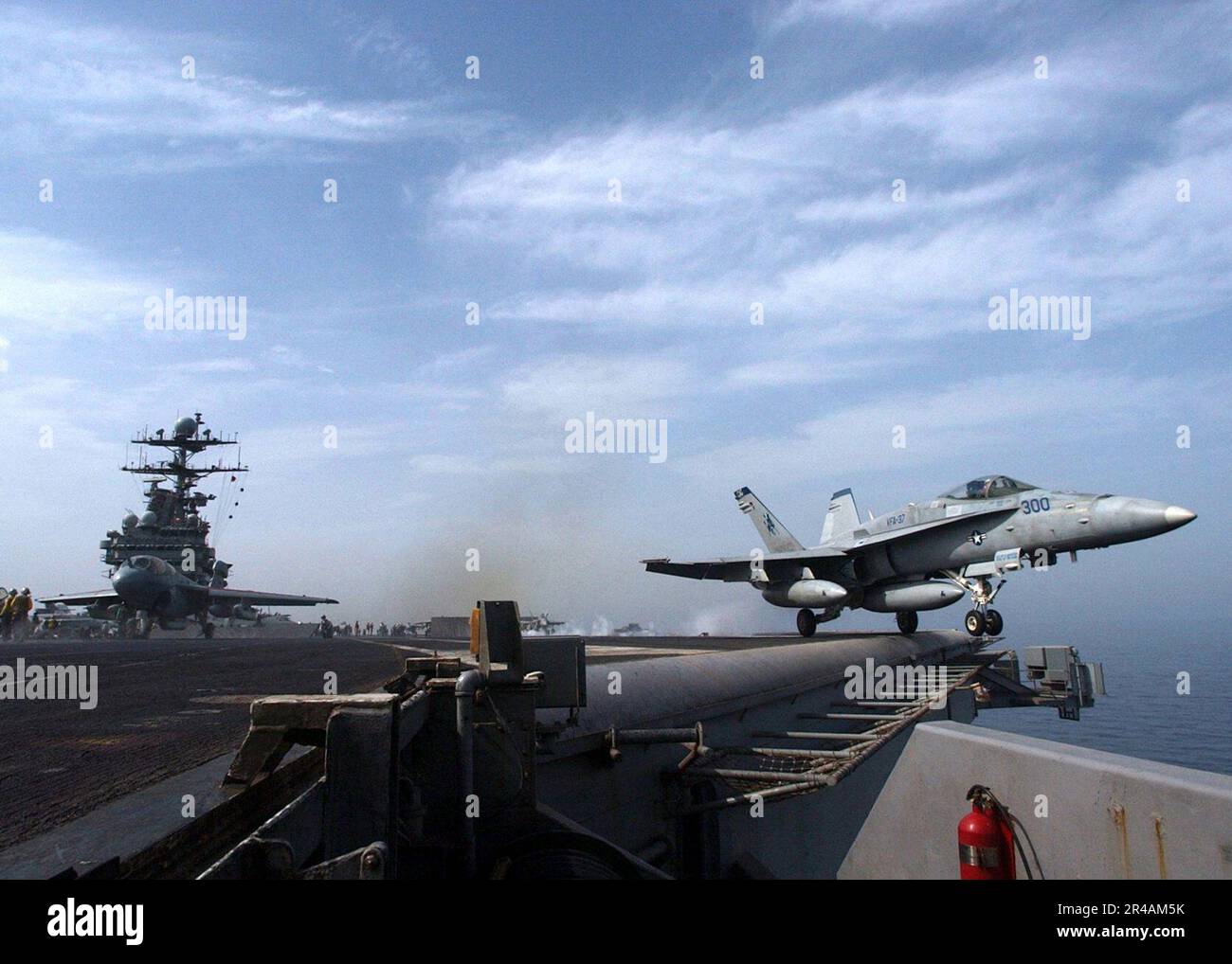US Navy An F-A-18C Hornet launches from the flight deck of the Nimitz ...