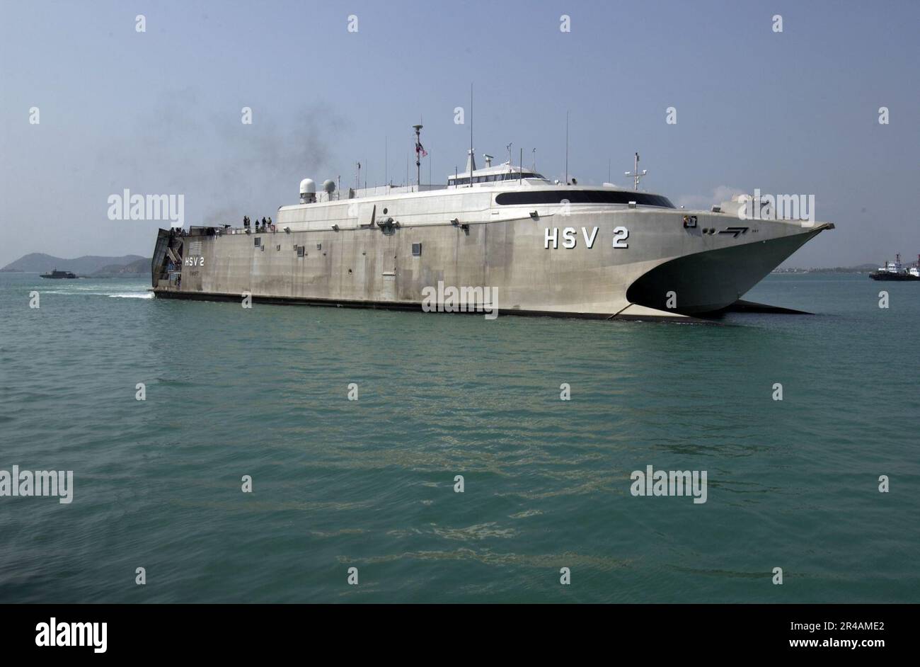 US Navy The High Speed Vessel Two (HSV-2) Swift prepares to dock at the ...