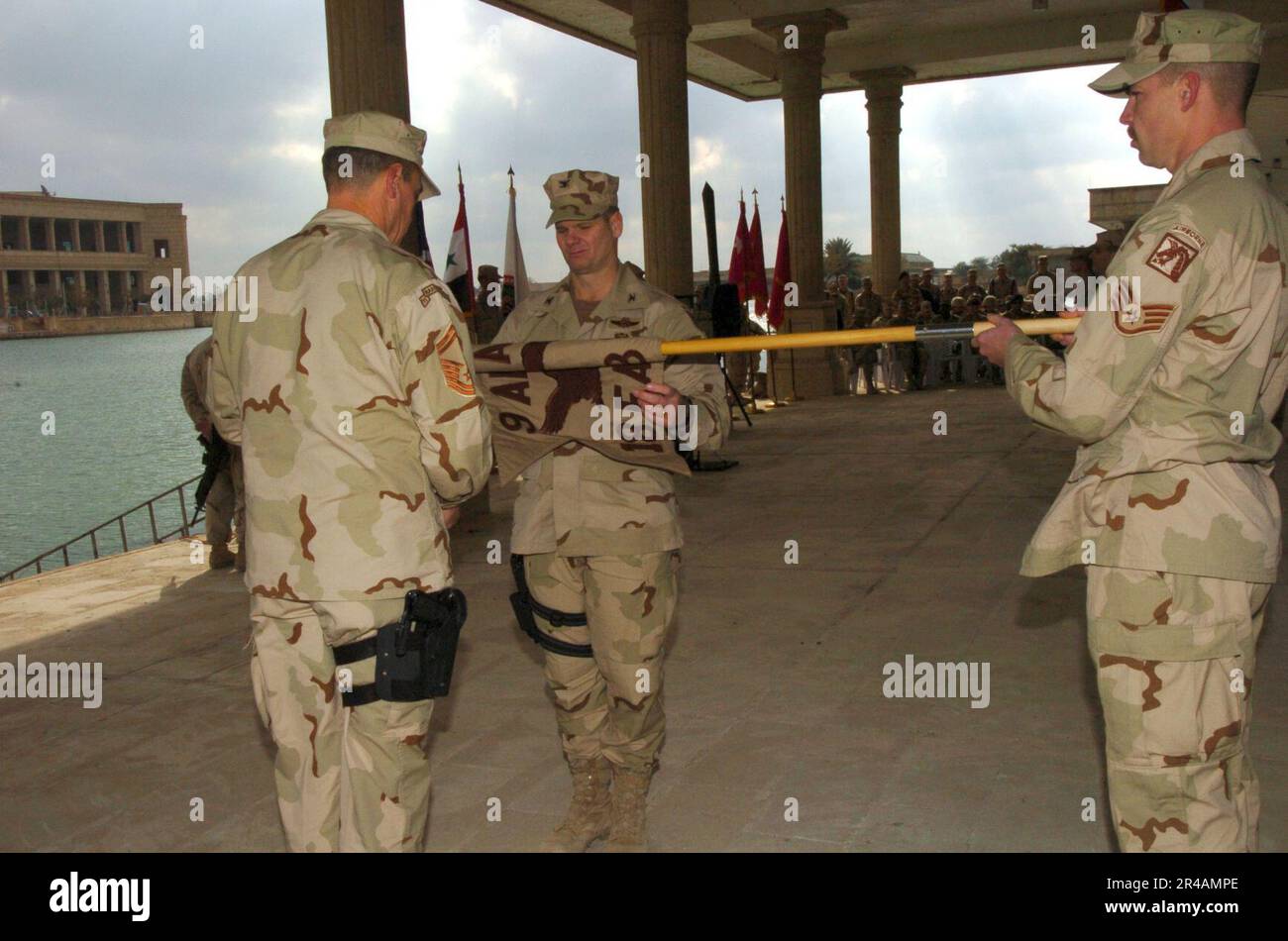 US Navy U.S. Army Col. Gentile rolls down the flag of 18th ...
